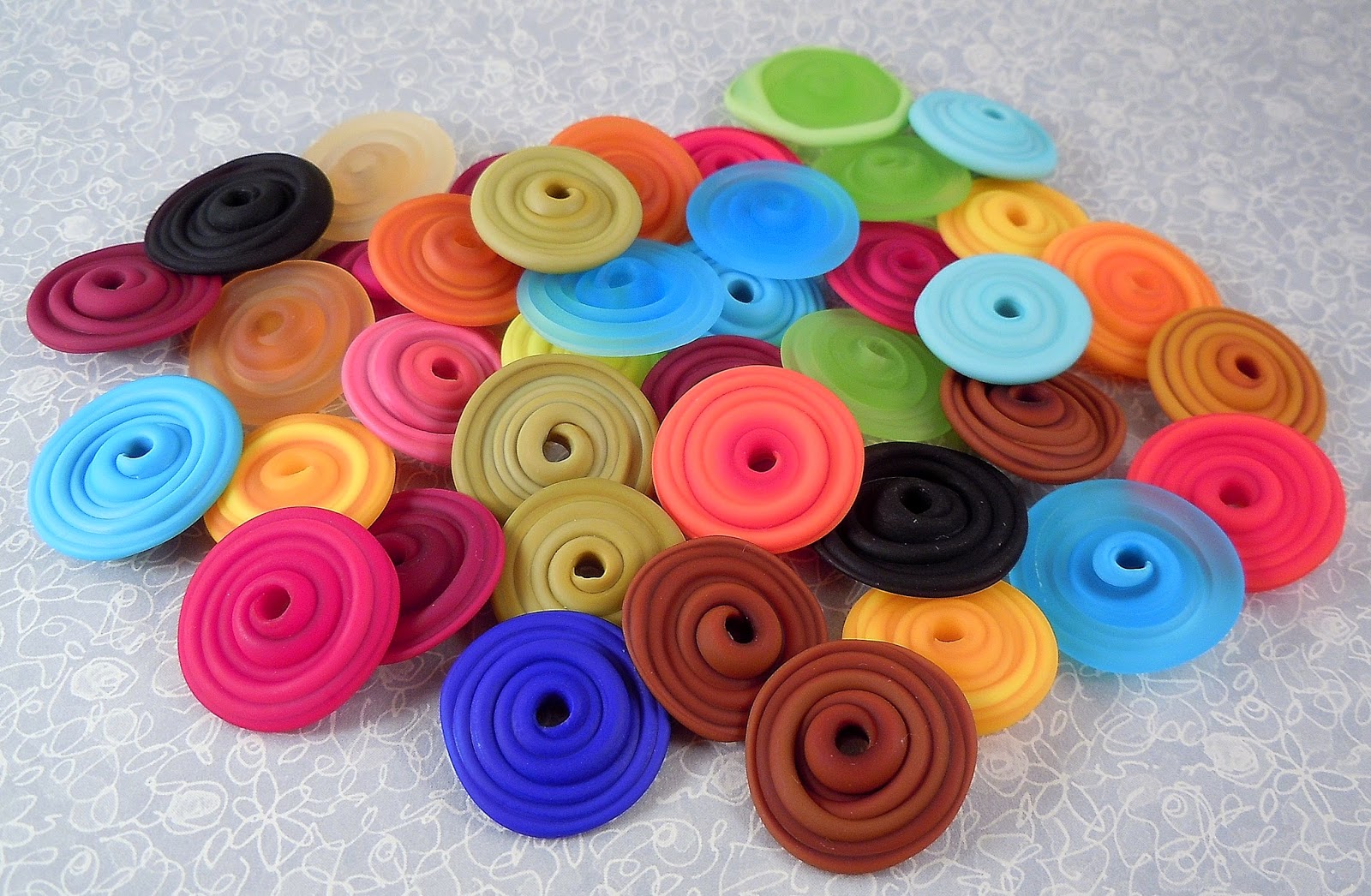 TanyaMcGuire: Discs to go with my Prehistoric Series of Beads