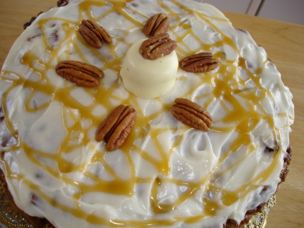 I garnished this cake with pecan halves and a white chocolate truffle ...