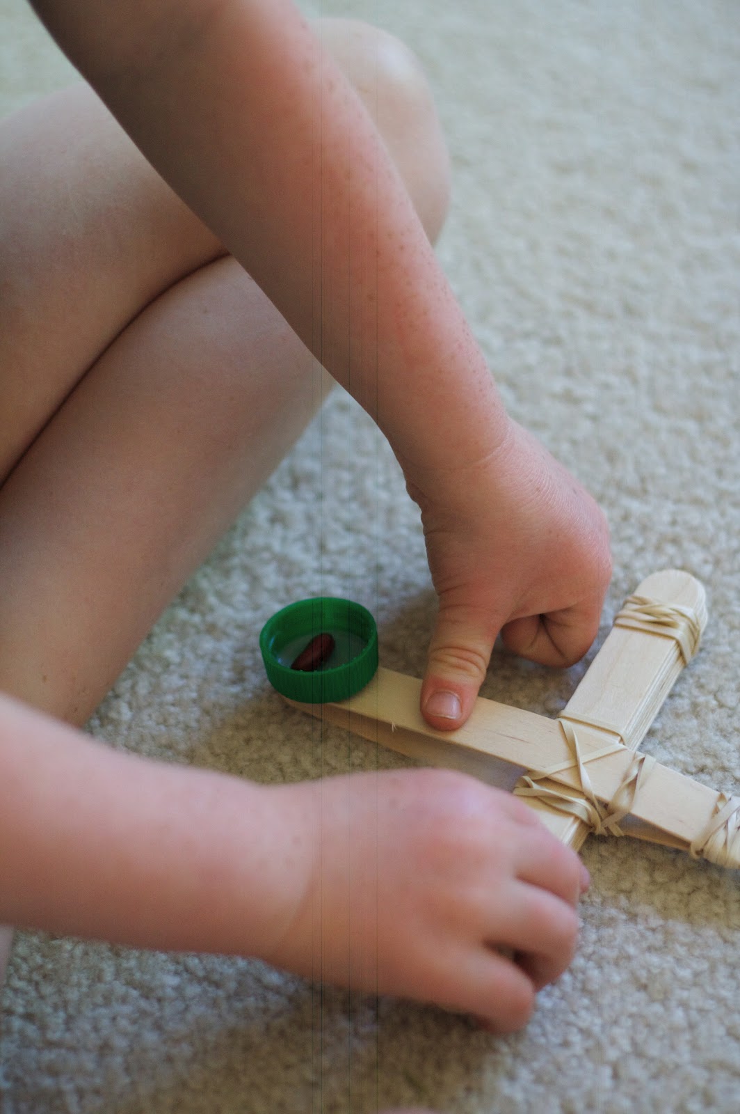 {create} popsicle stick launchers