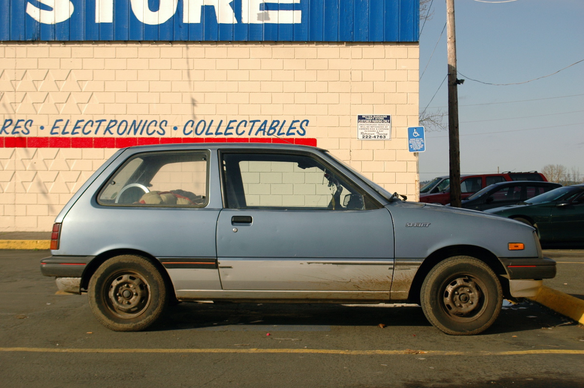 OLD PARKED CARS.: 1986 Chevrolet Sprint.