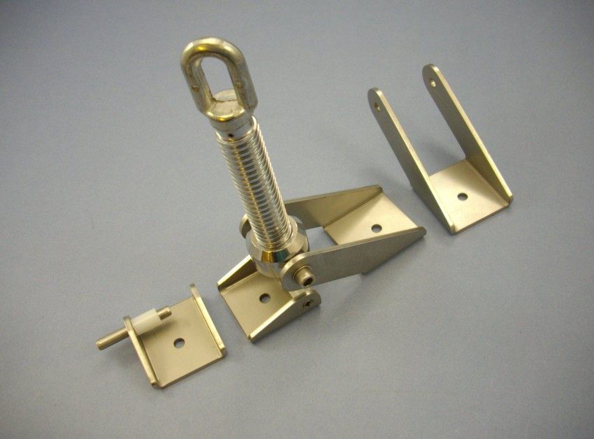 Metal Window Parts: Window Screwjack and Custom Brackets.