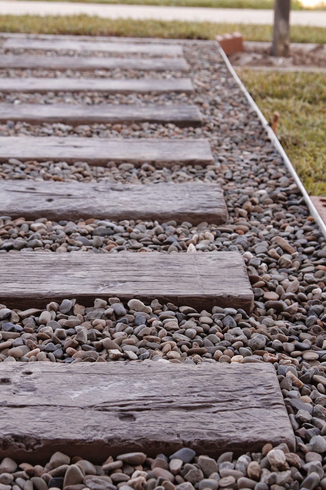 Building our house and making it a home: Railway Sleeper Paver path