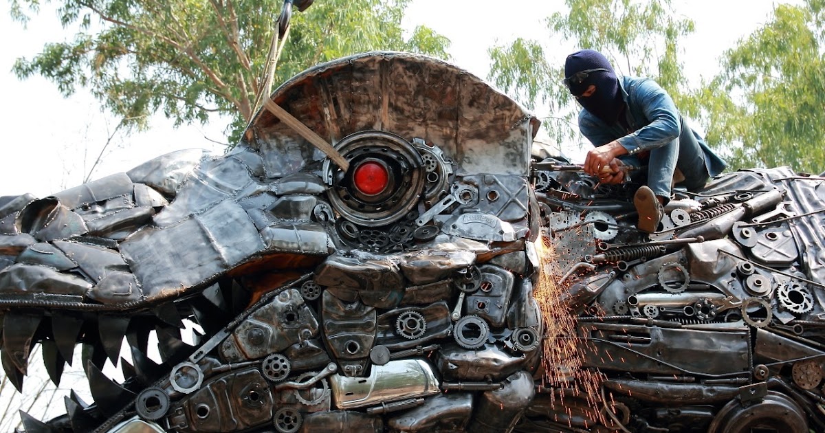 THE ROCKET T-REX DINOSAUR METAL SCULPTURE