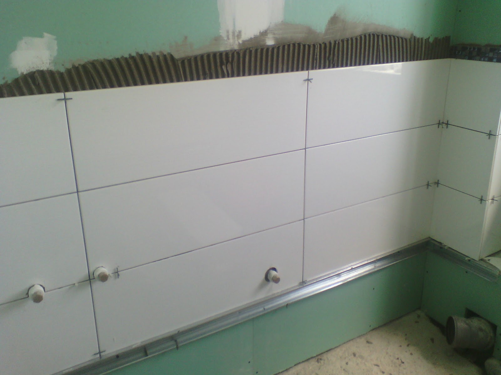 Arhiconstruct: Finisaje interioare Timisoara. Placare faianta si mozaic ...