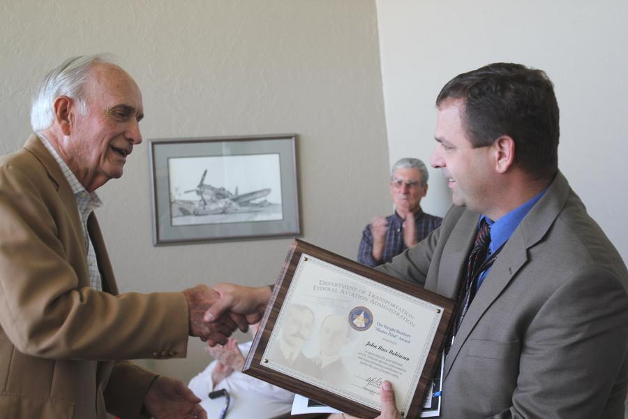 Kathryn's Report: Robinson joins elite group of pilots honored by ...