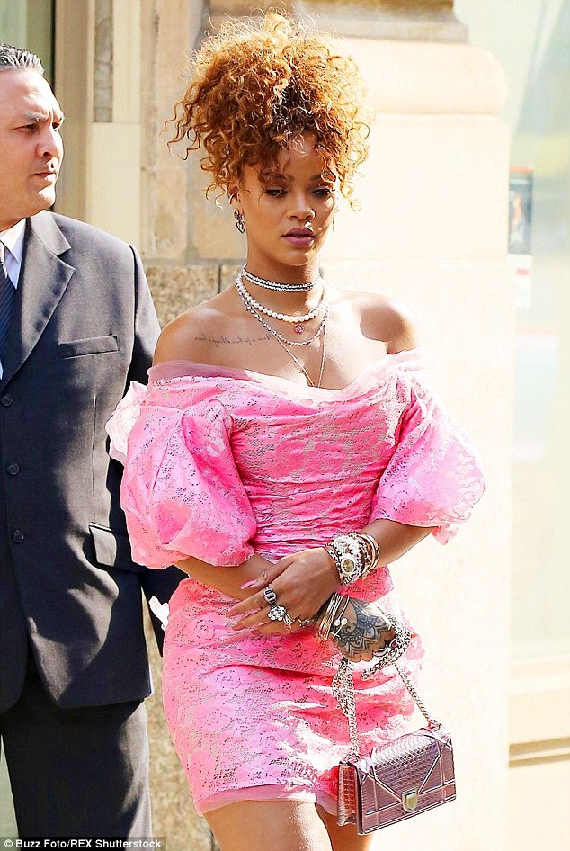 Photos: Rihanna steps out in pink 80s dress