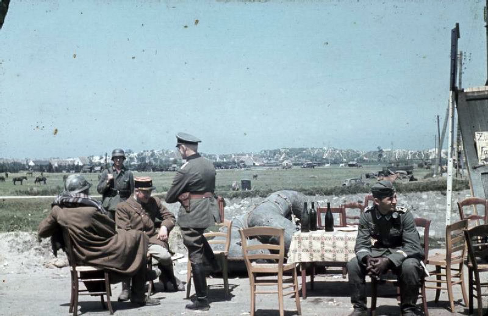 World War II in Color: German officer interrogates two captured French ...