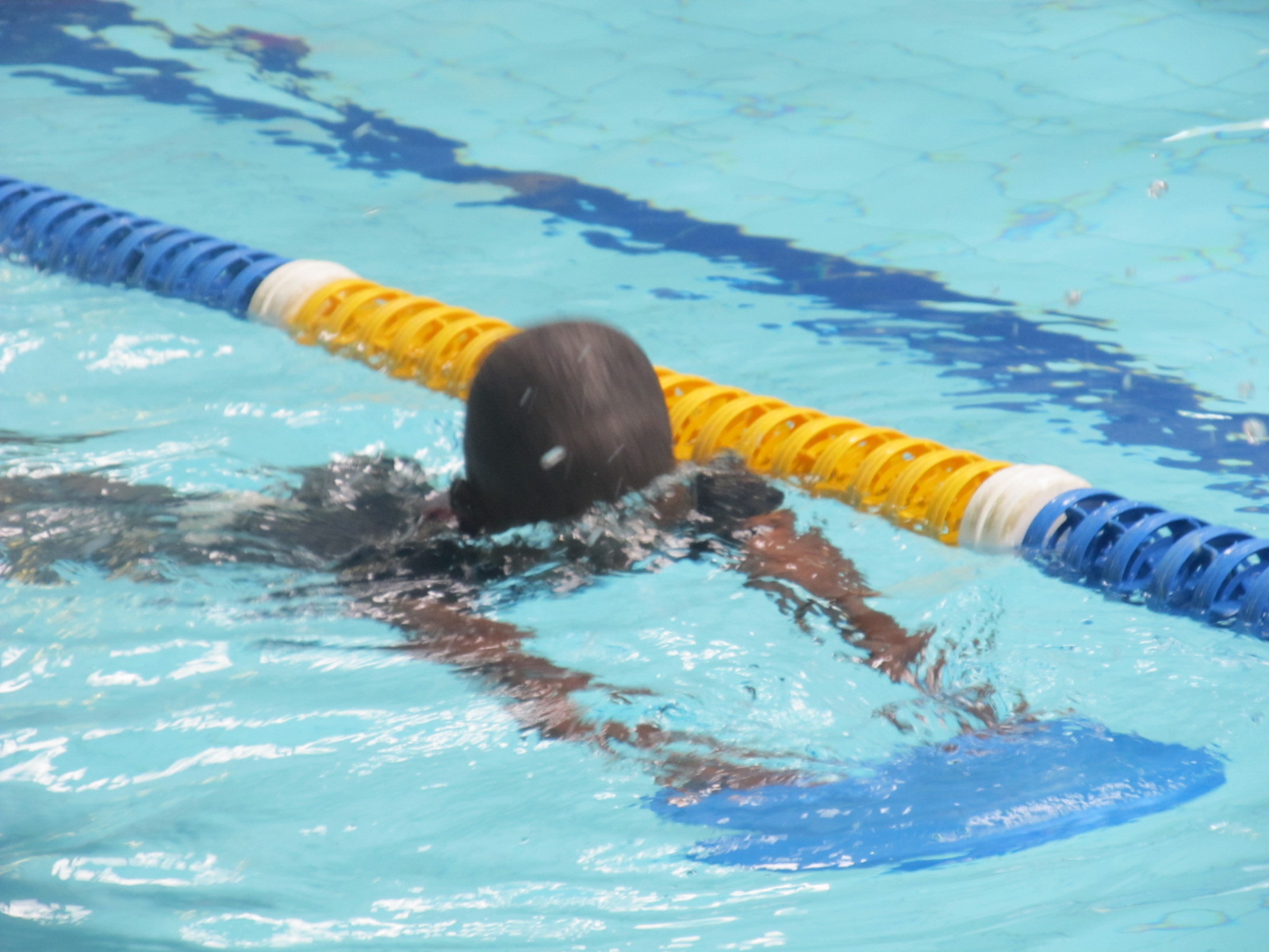 Flying High: Jonathan Enjoys Swimming Lessons at Glen Innes Pools