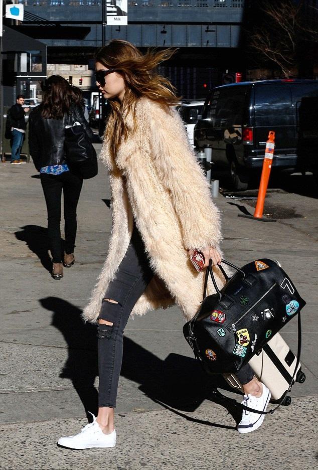 Gigi Hadid Travels Chic Carry-On Luggage | Fashion Blog by Apparel Search