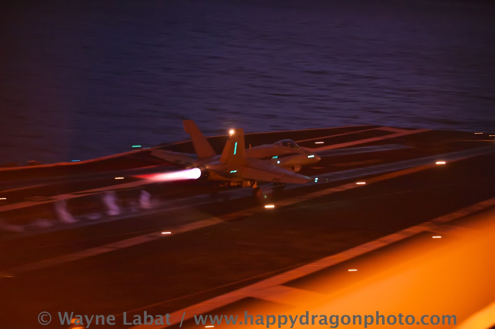 Night Flight Operations on an Aircraft Carrier