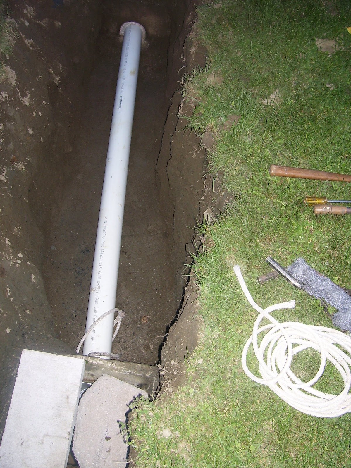 * Digging up my septic tank by hand for my 62nd birthday, 2006