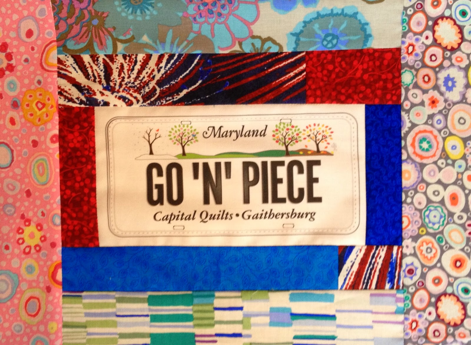 Susan's Quilt Creations: More rows and license plates