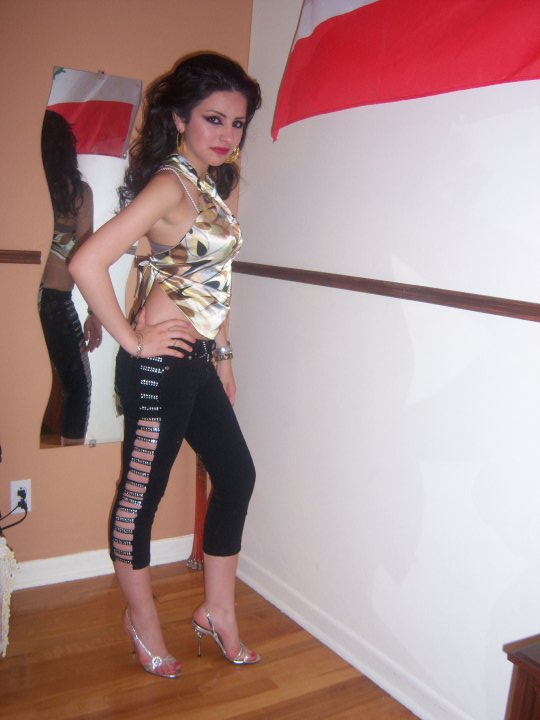 Beauty of Queens: Libyan model front of mirror