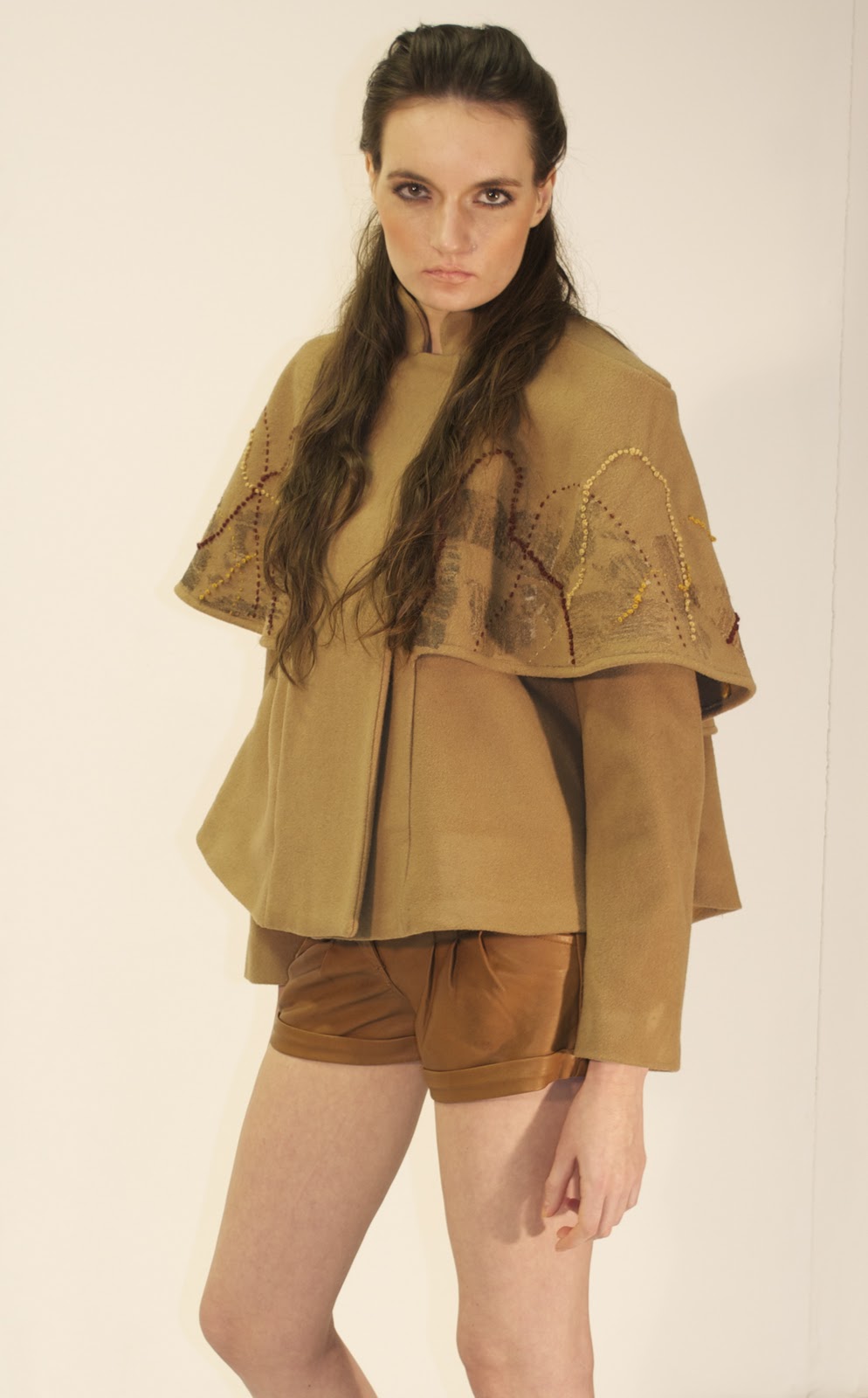 Proctor & Cruz Designs: I spy with my little Fashion eye.. some Cape Coats