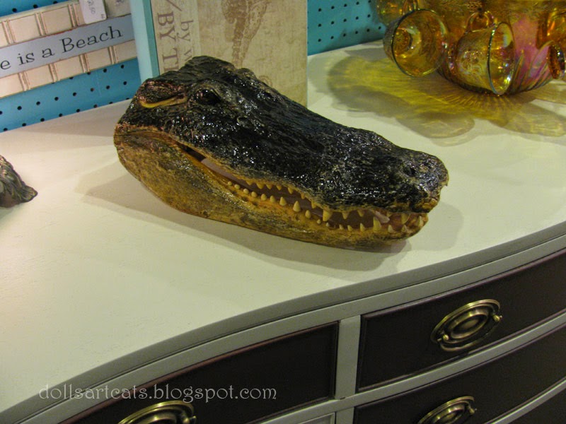 A Stuffed Gator Head, Water Hyacinths and a Bee