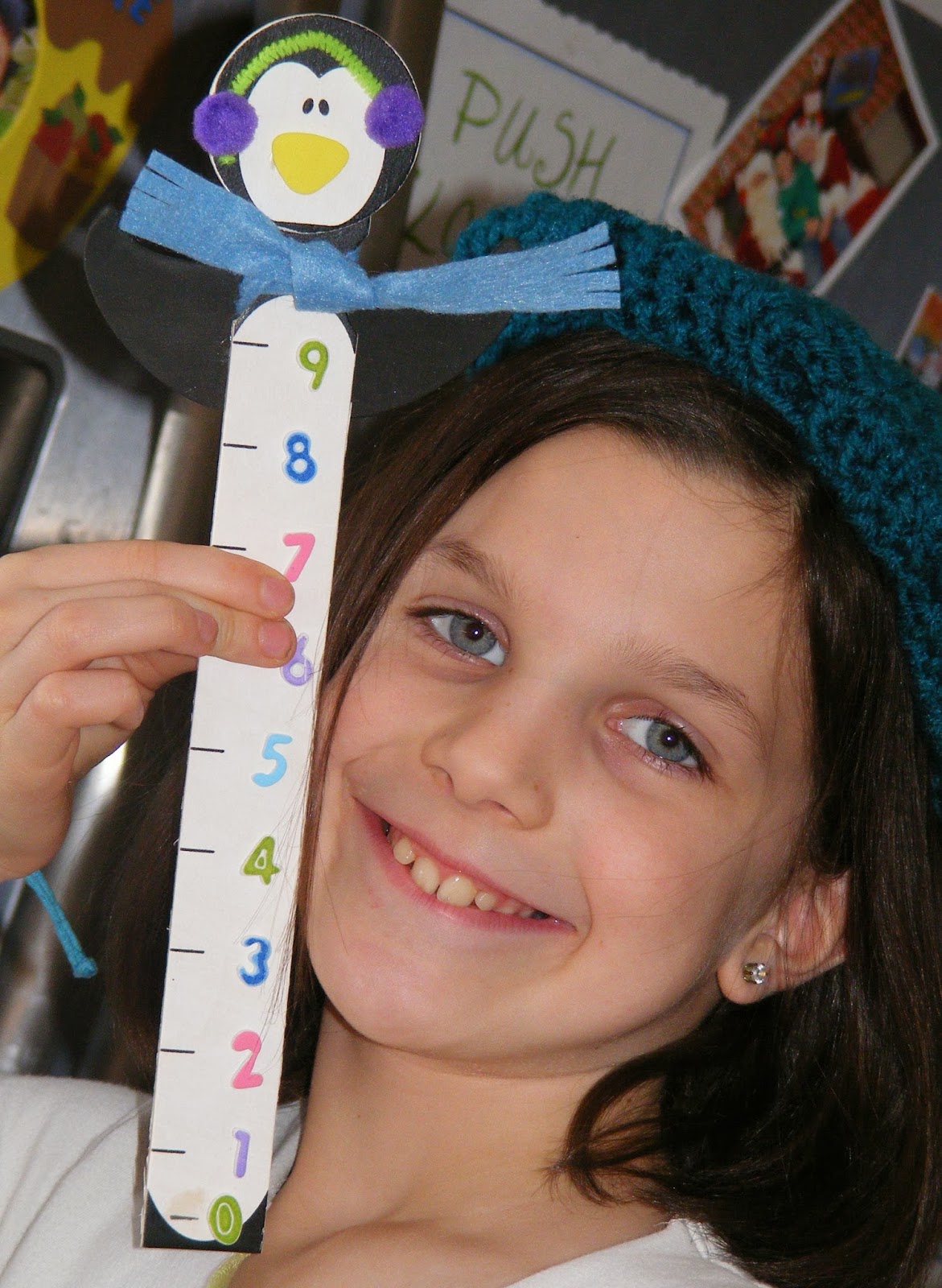 Ten kids and a Dog: A Penguin Snow Measuring Stick