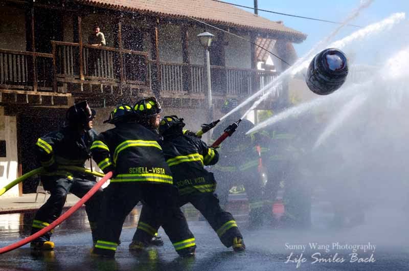 Sunny Wang Photography - Life Smiles Back: Firefighter Water Fight!