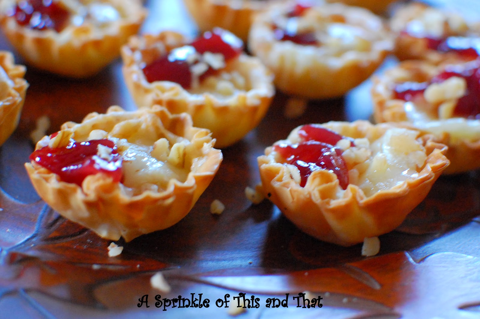 A Sprinkle of This and That: Raspberry Brie Tartlets