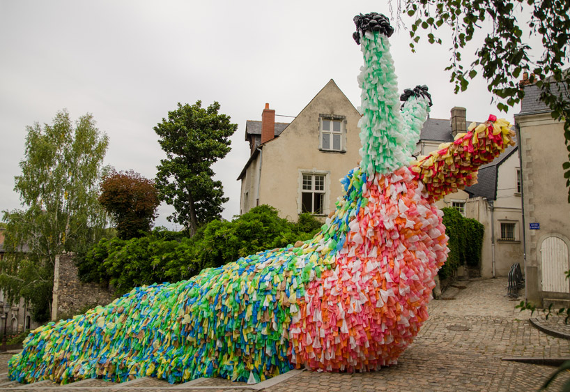Kuweight 64: ART - GIANT COLORFUL SLUGS WITH PLASTIC BAGS