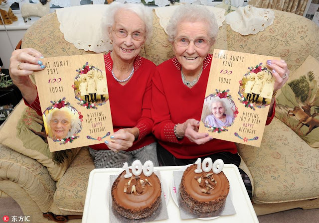 100-YEAR-OLD TWINS, IRENE AND PHYLLIS CELEBRATE BIRTHDAY IN STOURPORT, UK