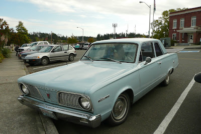 OLD PARKED CARS.: 1966 Plymouth Valiant 100.