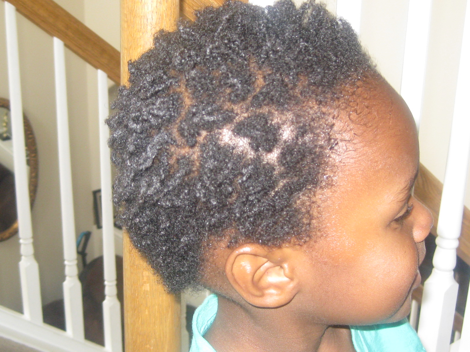 WHAT'S GOOD HAIR?: LEARNING AND LOVING HIS WOOLLY HAIR