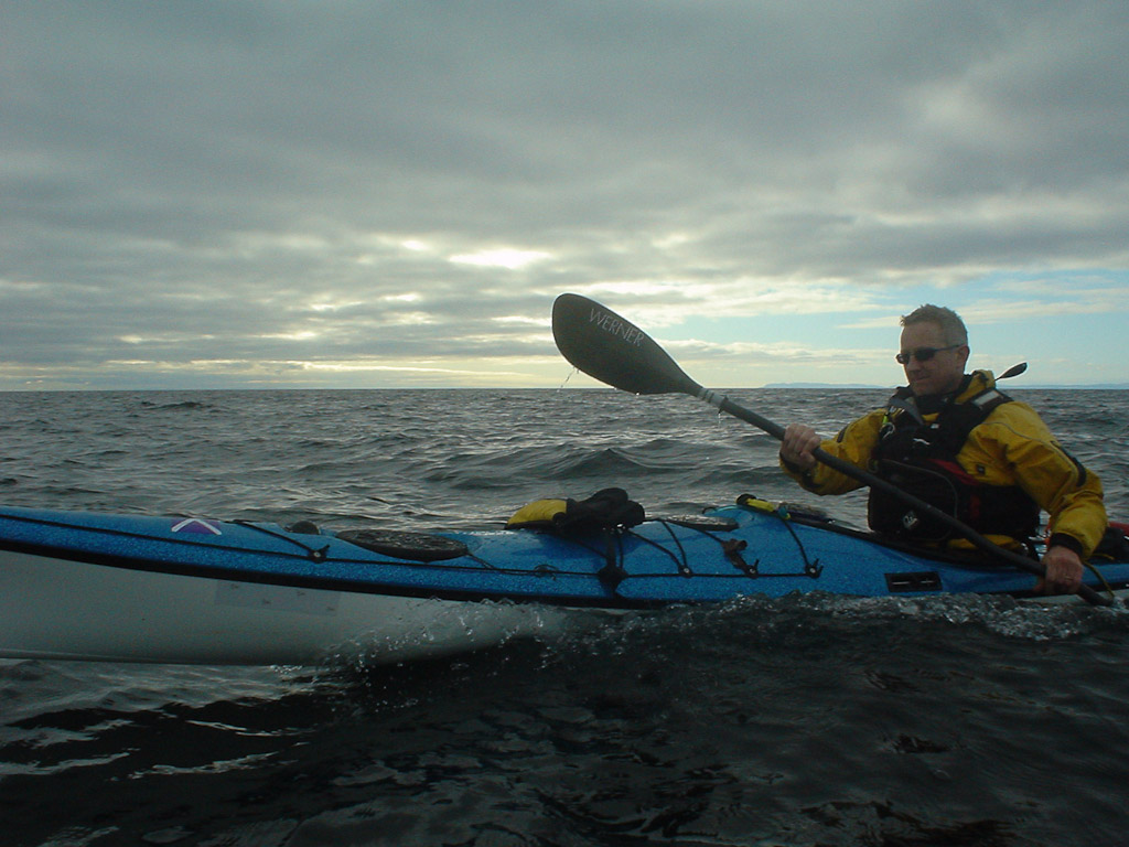 Sea kayaking with seakayakphoto.com: John Willacy surfed my wake!