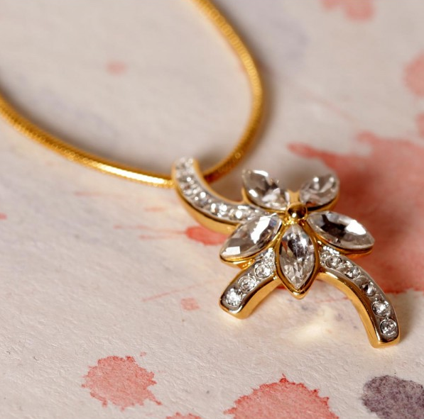 “Simplicity is the keynote of all true elegance.” : Gold Pendants For Girls