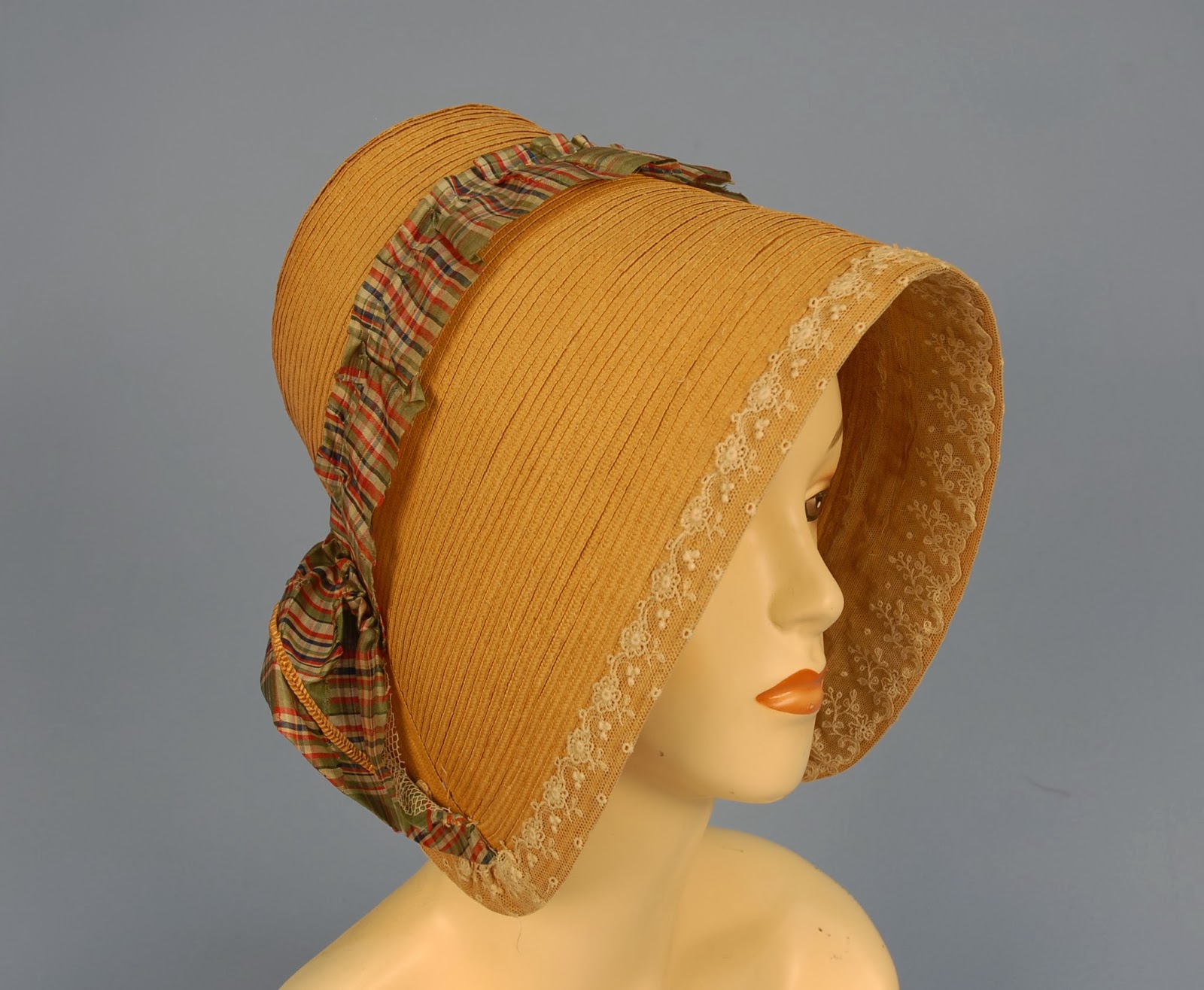 In the Swan's Shadow: Golden Straw Bonnet with Plaid Silk Trim, ca. 1850.