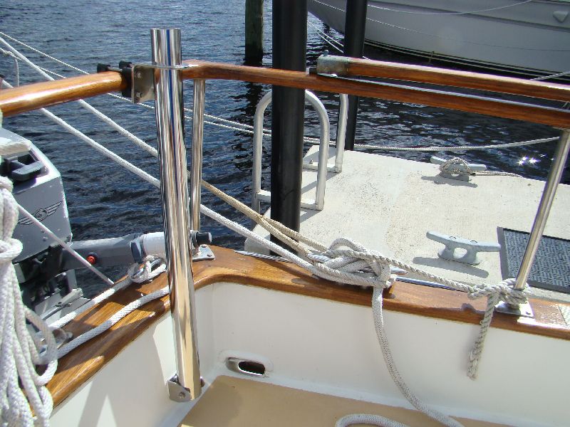 The Trawler Beach House: Our New Outboard Lift and Back Saver