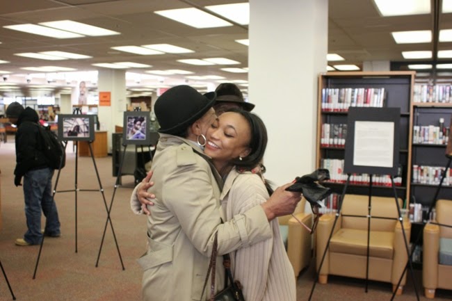 Cultural Front: Mr. and Mrs. Young visit exhibit at Lovejoy Library