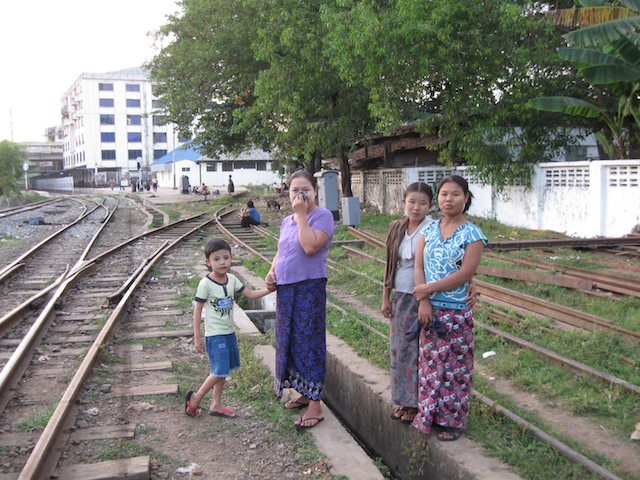 Shreds of a bizarre world: The Rangoon (Yangon) train station slum ...