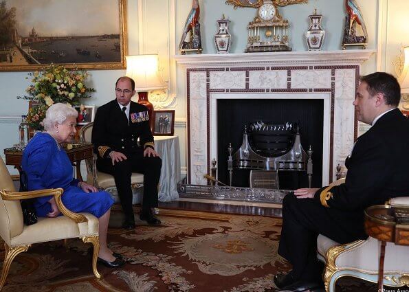 Queen Elizabeth II received Commodore Stephen Moorhouse and Captain ...