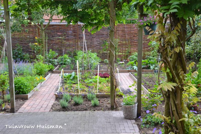 Tuindesign: Tuinontwerp voor een moes- en siertuin van Tuinvrouw Huisman