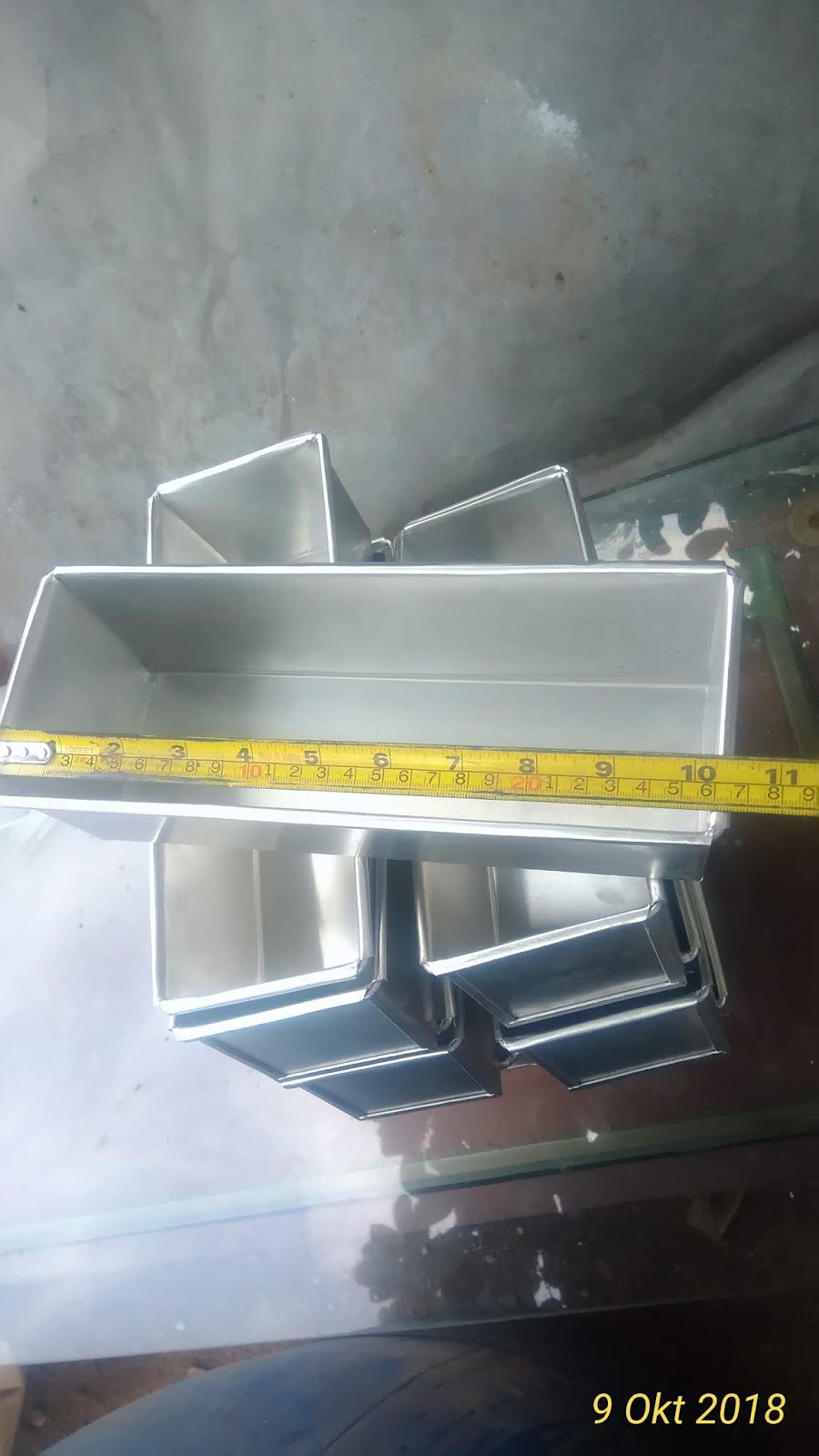 Pengrajin loyang dan langseng /tong air