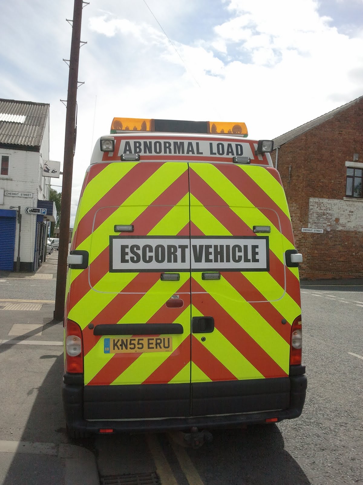 The Green I Signs Blog: wide load escorting vehicle stripes in day glo ...