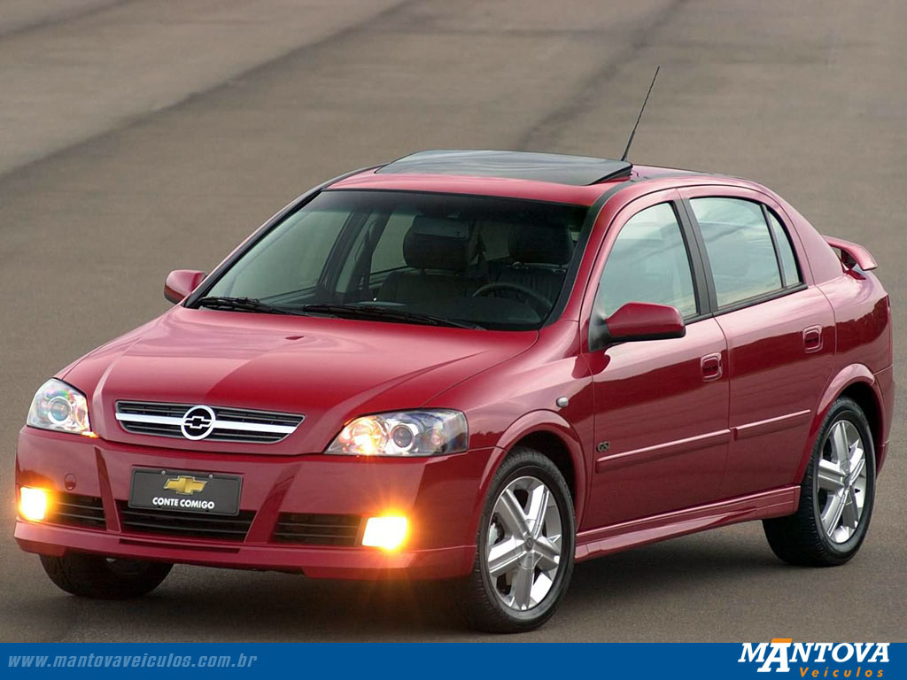 AUTOMOVEL V8 V10 V12 V16: CHEVROLET ASTRA VERMELHO QUATRO PORTAS