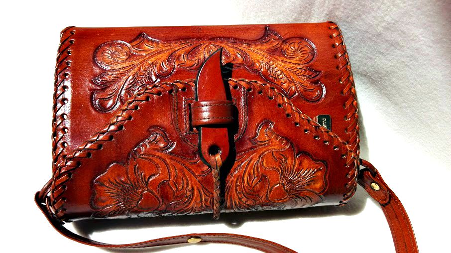 brandylovesvintage: vedasto: convertible tooled leather bag