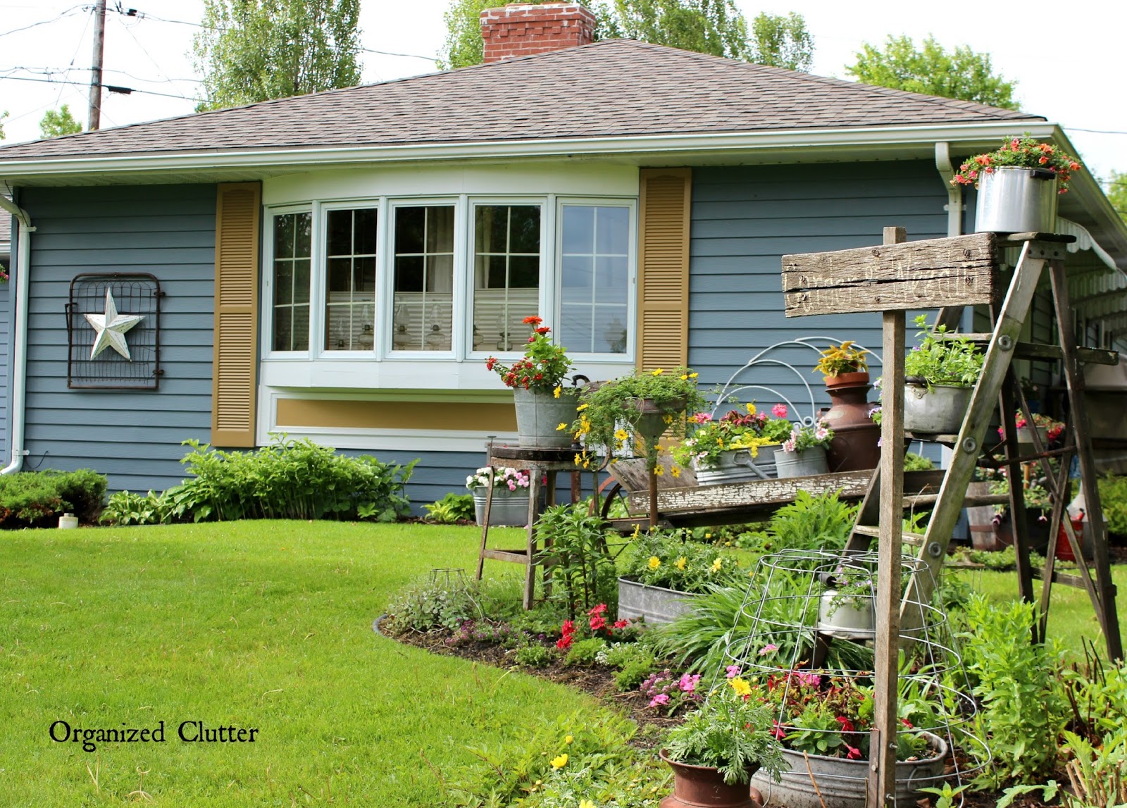 How To Add Vertical Interest to the Flower Garden - Organized Clutter