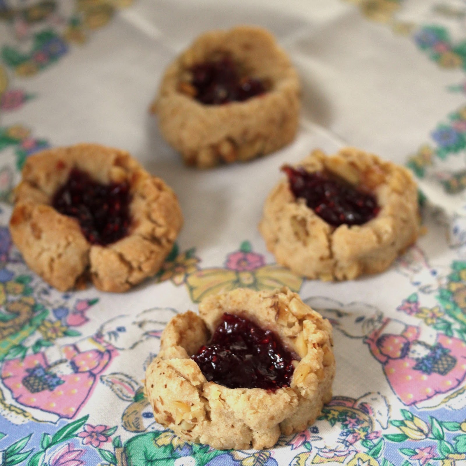 Raspberry Walnut Thumbprint Cookies | Kitchen Grrrls.