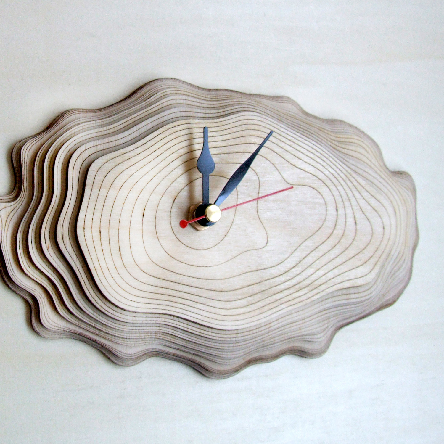 Dezign4u: Asymmetree. Parametric + Laser Cut Clocks
