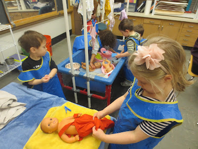 SAND AND WATER TABLES: Baby washing 2016