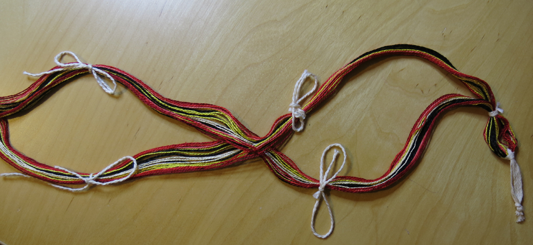 Durham Weaver: Making a warp and threading the 9 pattern slot heddle.