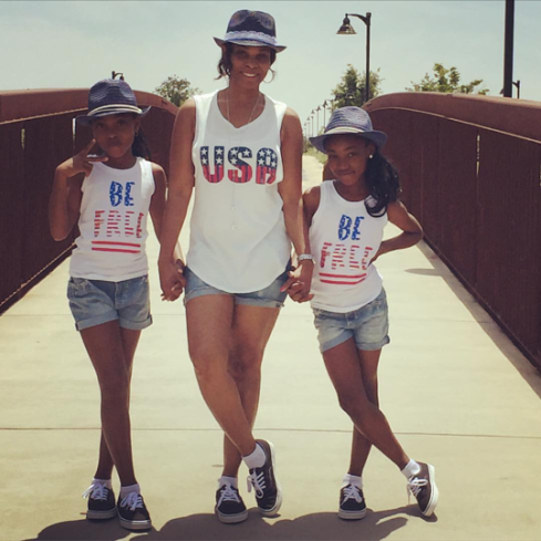 Actress Georgina Onuoha and her daughters take pics in matching outfits