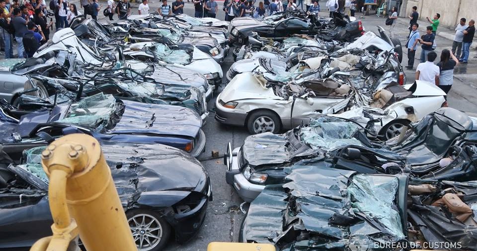 VIDEO: Duterte leads destruction of 20 smuggled luxury cars - The ...