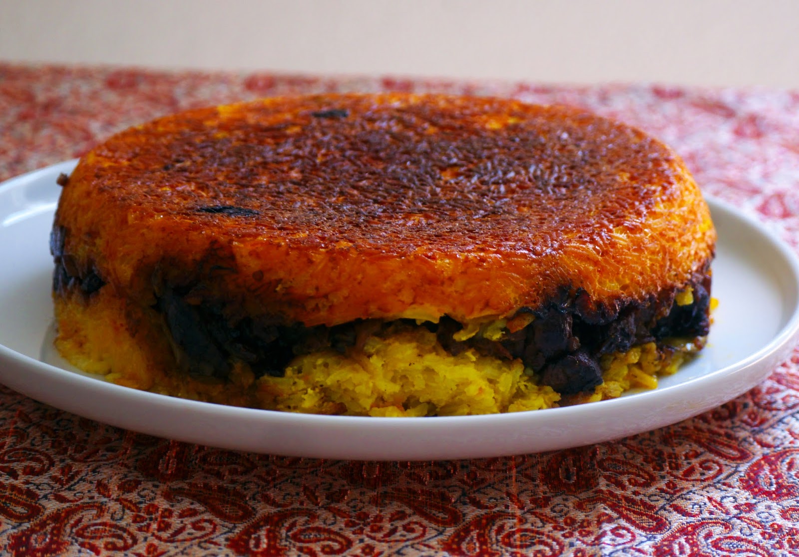 Persian Tahchin with braised beef and wild mushroom