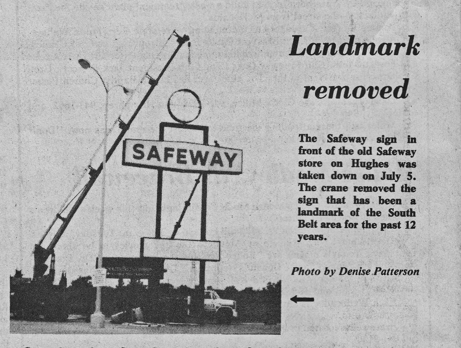 A Safeway sign being removed as the company pulled out of Houston, Tx ...