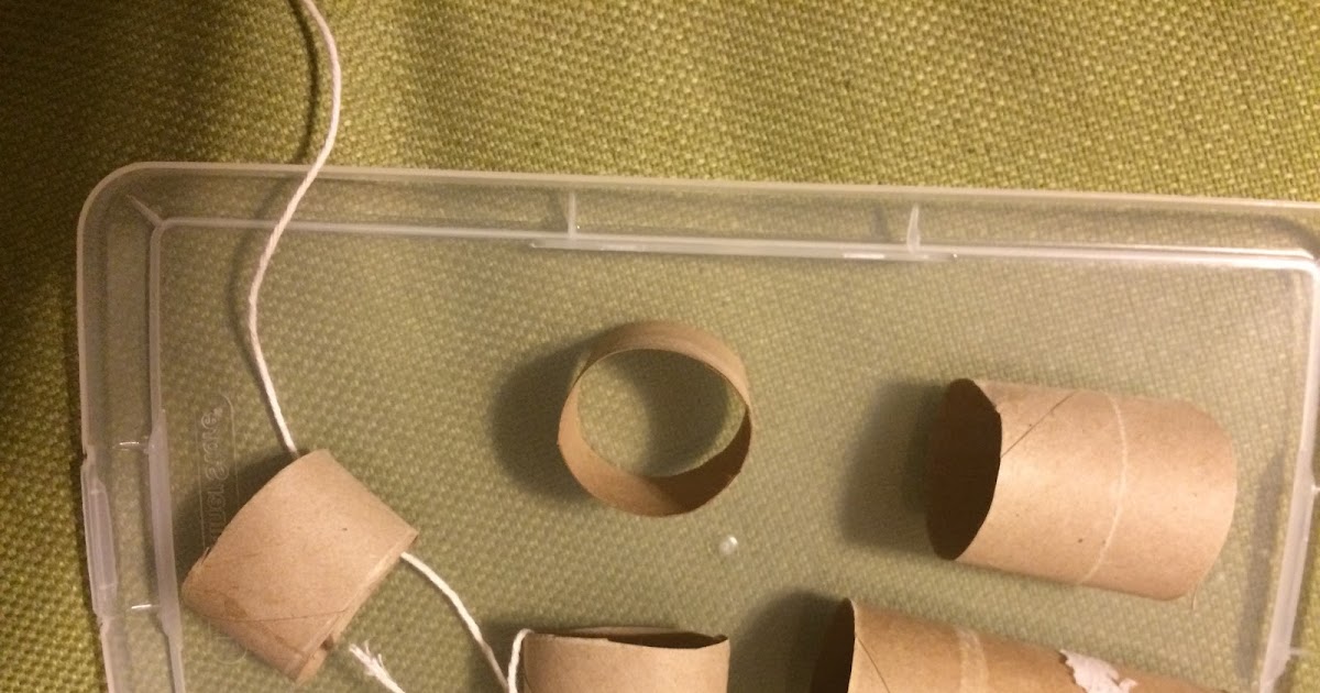 Raising a Mama: Toddler activity: threading toilet paper rolls