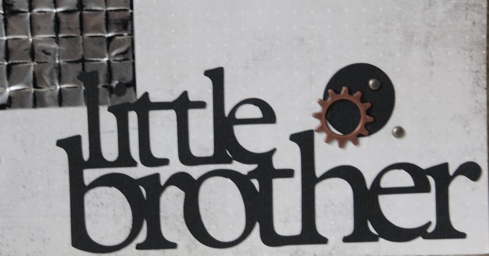 Amy Corbin: Little brother layout with Chomas Creations embossing kit