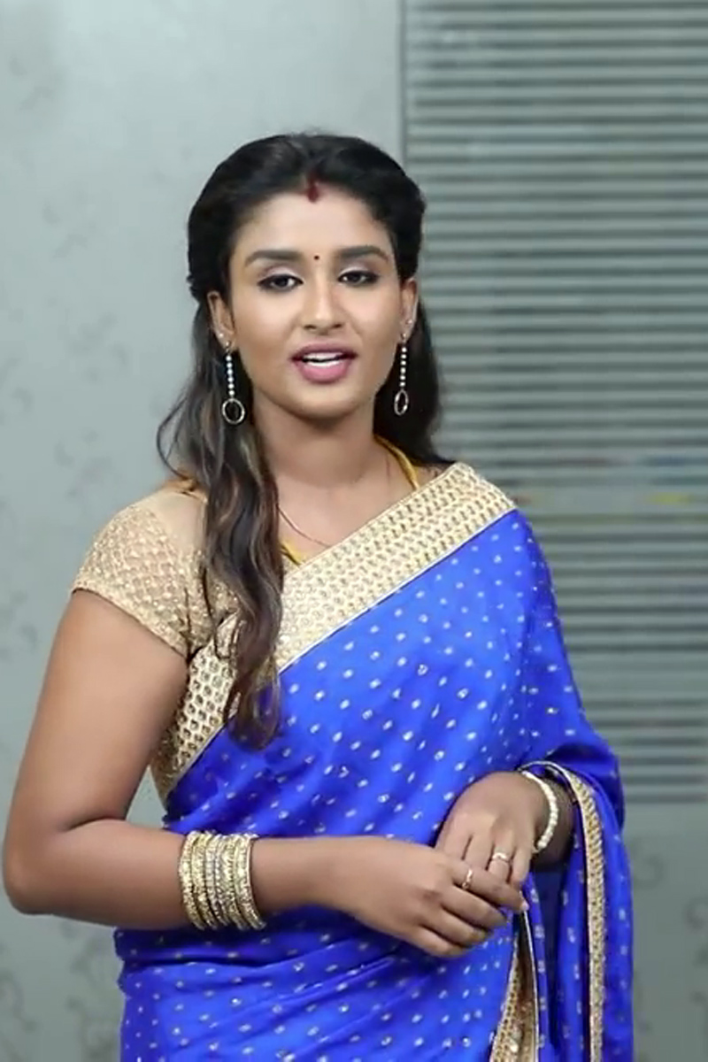 Actress Reshma Reya Beautiful Stills In Blue Saree